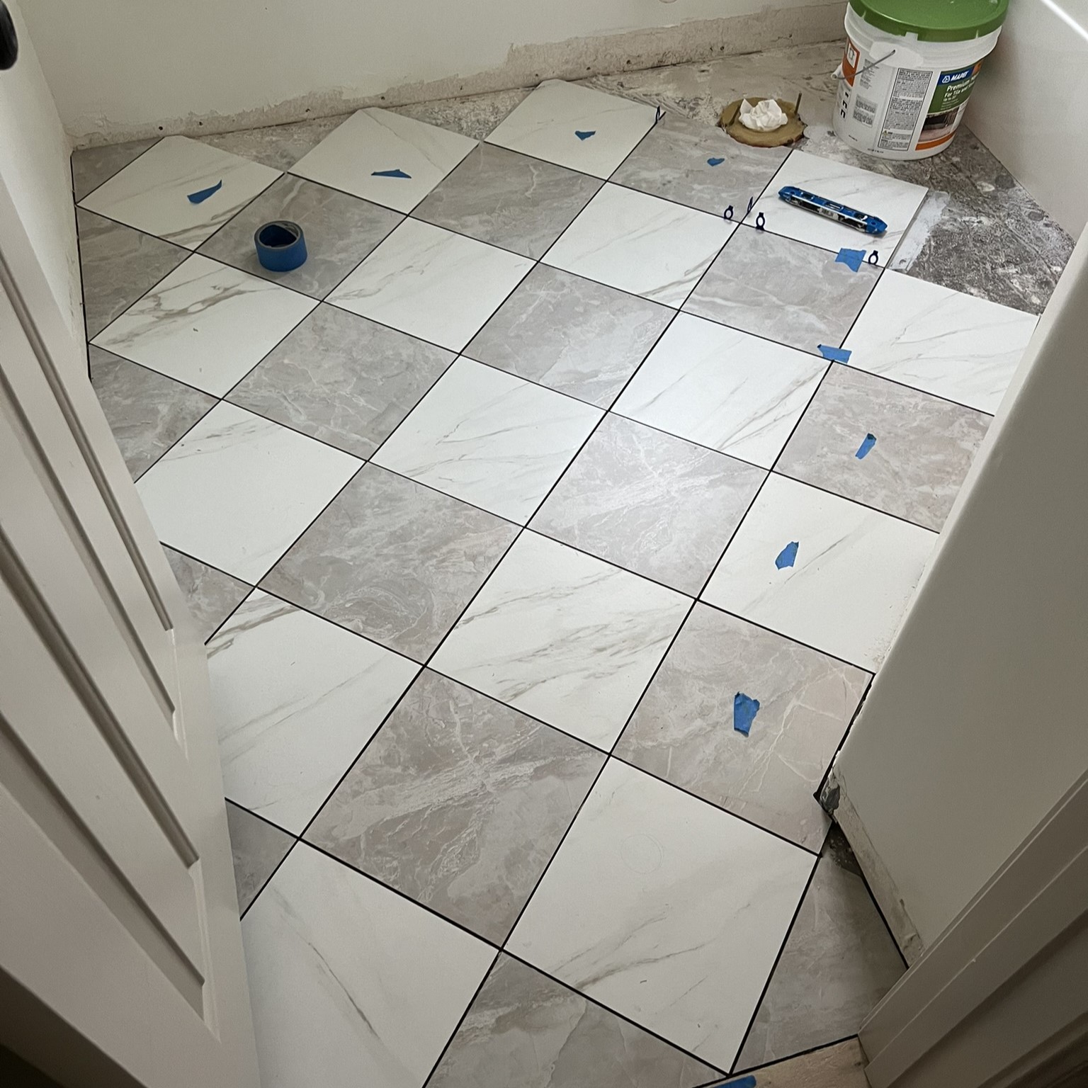 How to Install the Perfect Tile Checkered Floor - haus & hand